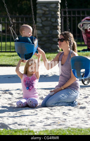 Rhea Durham and her daughters Ella and Margaret Grace. play at ...