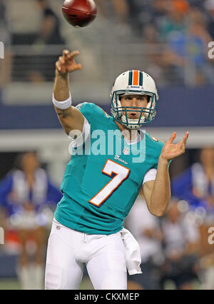 Miami Dolphins quarterback Pat Devlin warms up before a preseason NFL ...