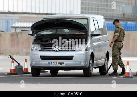Army searching cars at a security checkpoint, UK Stock Photo - Alamy