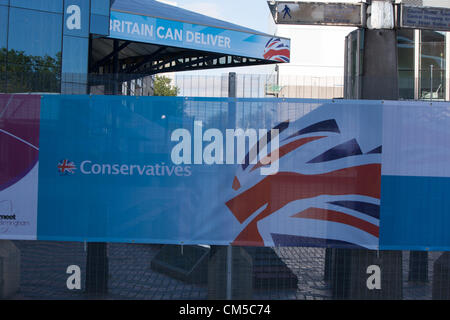 Conservative Party banner fixed to fence near the ICC for their ...