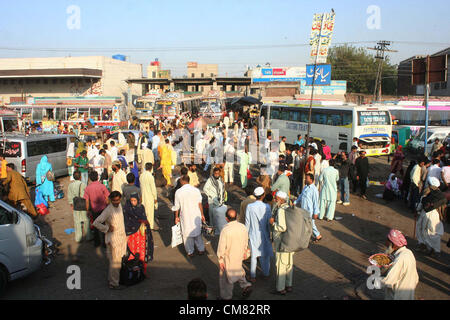 People gather at Lari Adda to board on passenger bus as they are going ...