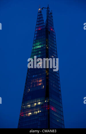 The Shard is illuminated with lasers and lights to mark its completion ...