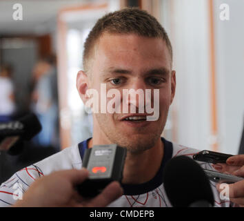 Czech rower Ondrej Synek speaks during a press conference prior to a ...