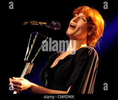 Florence Welch, lead singer of Florence and the Machine, shows off her ...
