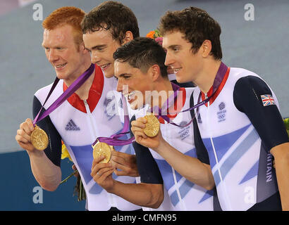 Gold medalists Edward Clancy, Geraint Thomas, Steven Burke and Peter ...