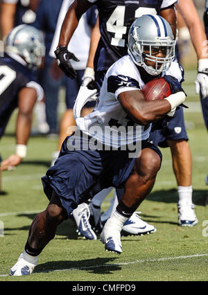 Dallas Cowboys running back Phillip Tanner gets up from the field after ...