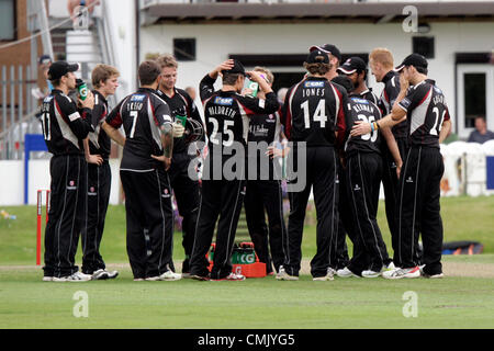 Scotland players celebrate taking the wicket of England's Heather ...