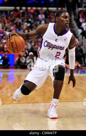 Los Angeles Clippers guard Darren Collison, left, gets past Denver ...