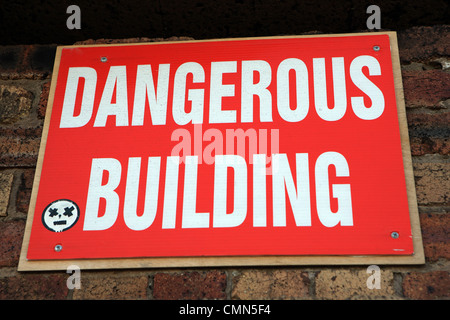 Warning sign for unsafe building Stock Photo - Alamy