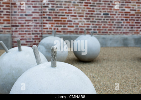 Art installation of cast concrete spheres called Antibodies,by Marcus ...