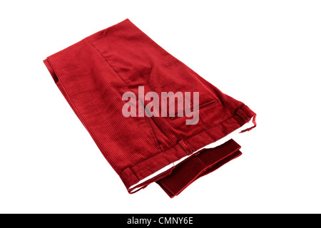 A pair of red corduroy men's pants on a black background Stock Photo ...