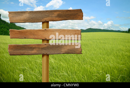 wooden sign on field grass mountain Stock Photo - Alamy