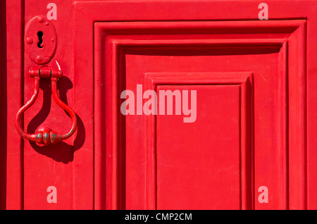 Red coloured Door handle at alfama district, Lisbon, Portugal Stock ...