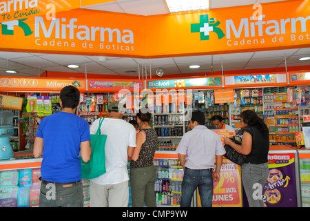 latino pharmacist at counter Stock Photo - Alamy