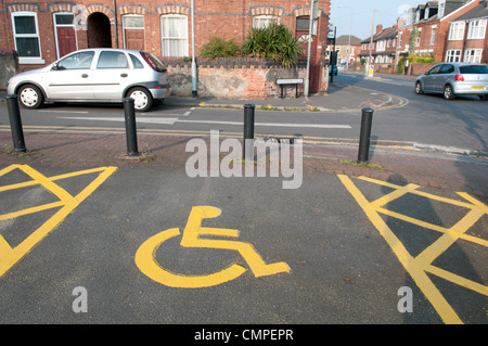 Disabled parking space with yellow hatching and number 372 Stock Photo ...