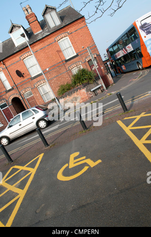 Disabled parking space with yellow hatching and number 372 Stock Photo ...