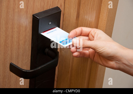 Opening a travelodge hotel room with a key card Stock Photo - Alamy