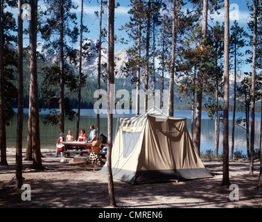 1970s FAMILY CAMPING VACATION CAMPSITE MOTHER COOKING ON CAMP STOVE ...