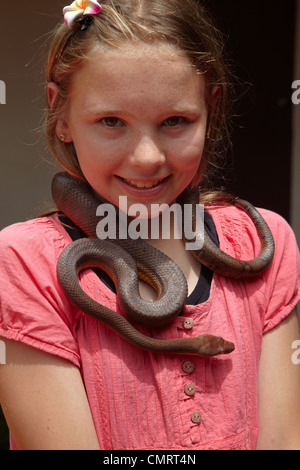 Girl and Fijian boa constrictor (Candoia bibroni bibroni), Kula Eco ...