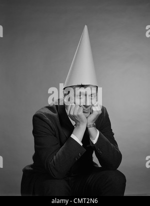 Man Wearing Dunce Cap Stock Photo - Alamy