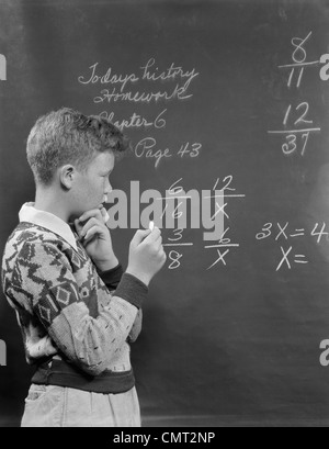 Child doing a math multiplication at school Stock Photo - Alamy