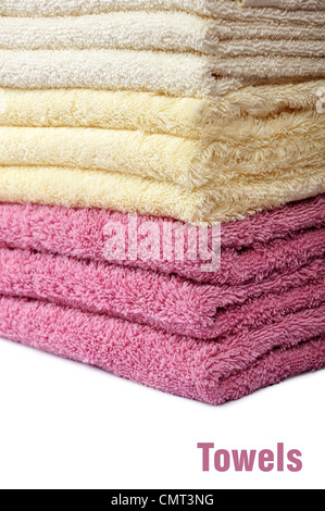 Stack folded purple, yellow, green baby cotton clothing on white ...