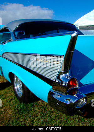 Classic saloon cars racing at the Goodwood Revival. Group of vintage ...