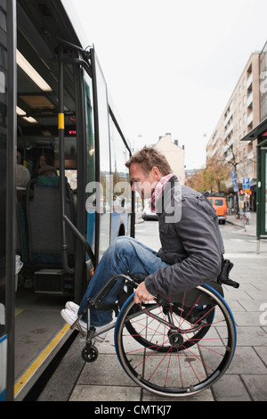 man entering bus Stock Photo - Alamy