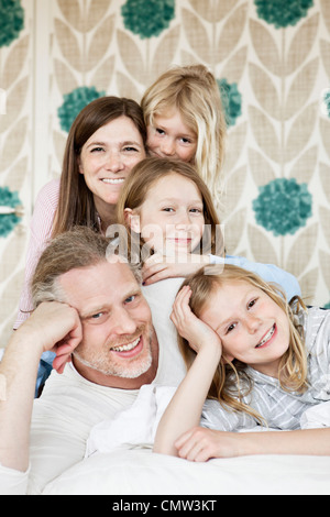 Portrait of a family smiling Stock Photo - Alamy