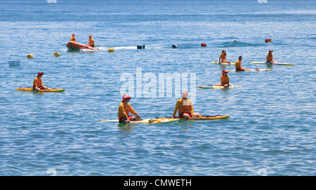 Surf Lifesaving boat and surf lifesavers / lifeguards in the sea at ...