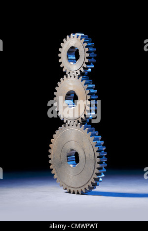 Still life with three cog gear wheels stacked on eachother Stock Photo ...