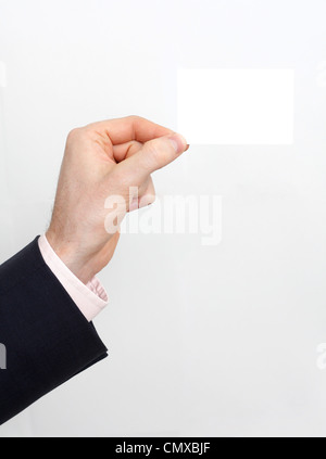 Young business man holding blank banner over isolated background very ...