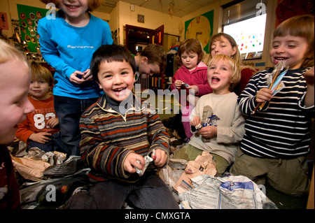 Children playing pass the parcel Stock Photo - Alamy