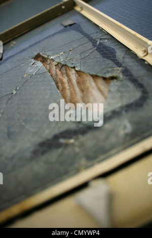 Broken reinforced glass Stock Photo - Alamy