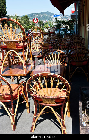 Stack of Brown Chairs and Tables in Front of Restaurant Stock Photo - Alamy