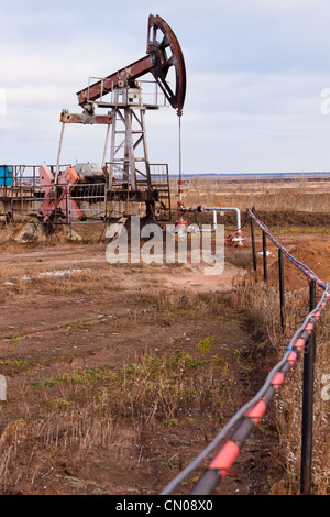 Rusty and worn oil pump and pipe Stock Photo - Alamy