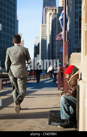 Homeless man at Michigan Avenue Bridge Chicago Illinois Stock Photo - Alamy