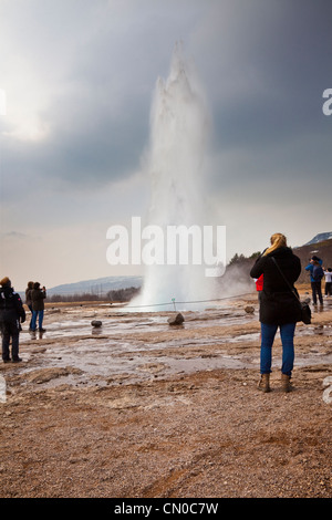 Explosion in rock formation with people running, man diving Stock Photo ...
