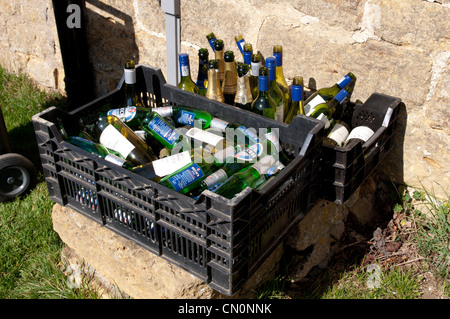 Crates of glass bottles out for recycling collection, Hattingley ...