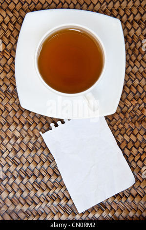 Tea and blank paper on sedge background Stock Photo - Alamy