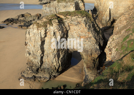 Rock archway at Perranporth beach, North Cornwall, England, UK Stock ...