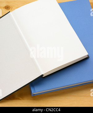 Notebooks on a wooden background Stock Photo - Alamy