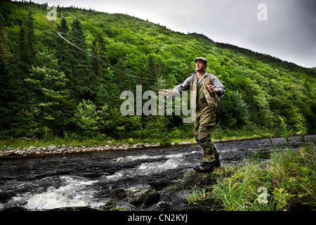 Fly fisherman in Margaree River, Cape Breton Island, Nova Scotia Stock Photo - Alamy