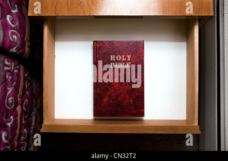 Holy Bible in a hotel room nightstand open drawer with copy space for ...