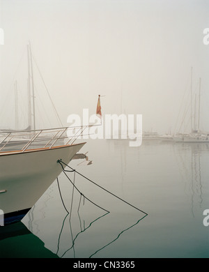 The boat in a fog Stock Photo - Alamy