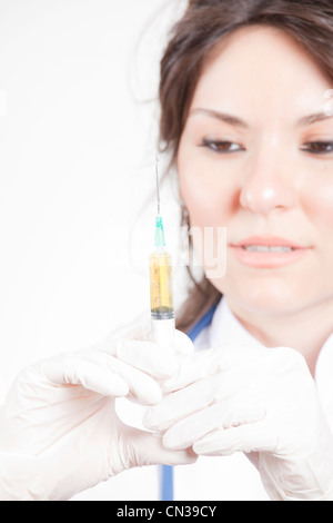 young Asian woman doctor hold clipboard smile at modern medical clinic ...