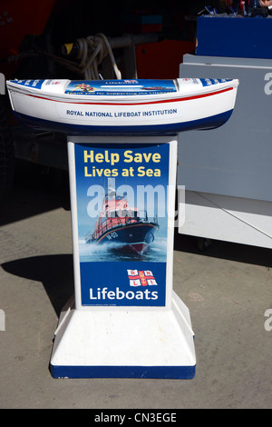 A charity donation collection box for the Royal National Lifeboat ...