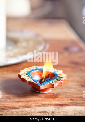 Portrait of Hindu new year diwali ghee lamp candle diva diwa overhead ...