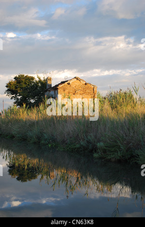 Landscape with farm house and canal, Cervia, Ravenna, Italy Stock Photo ...
