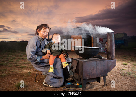 Mongolian woman cooking outside kitchen , Mongolia Stock Photo - Alamy